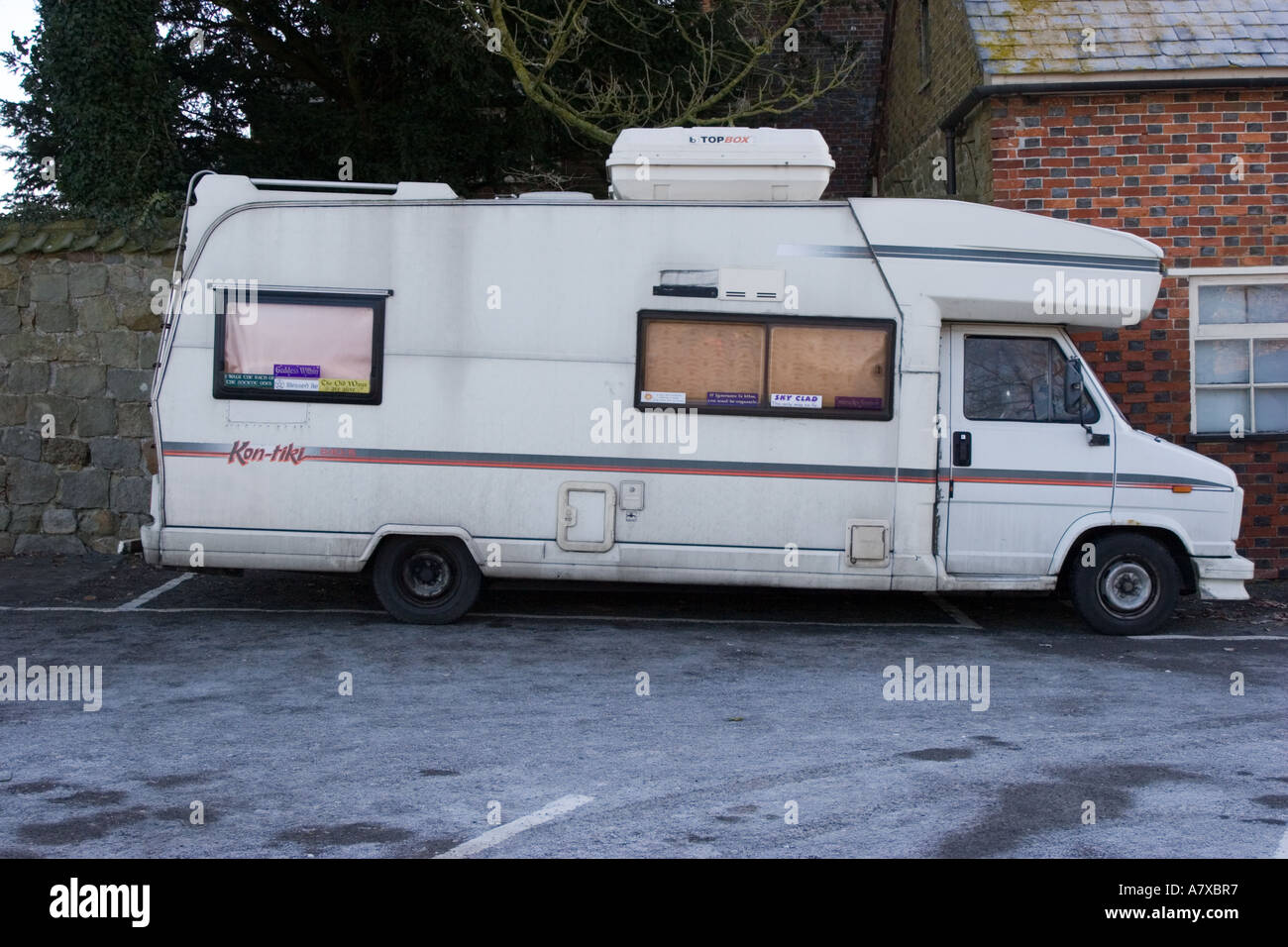 Ancient camper van in pub car park Stock Photo - Alamy
