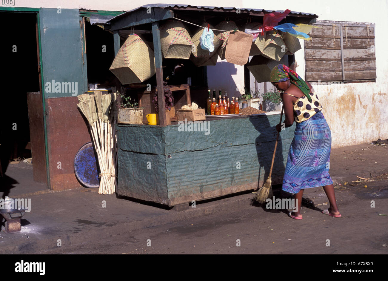 Woman sweeping africa hi-res stock photography and images - Alamy