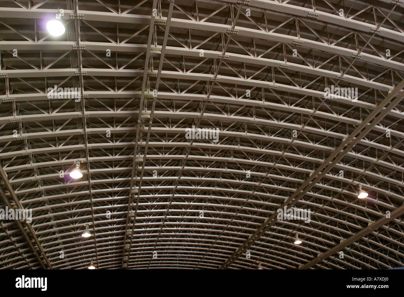 Metal arched roof inside an aircraft hangar Stock Photo - Alamy