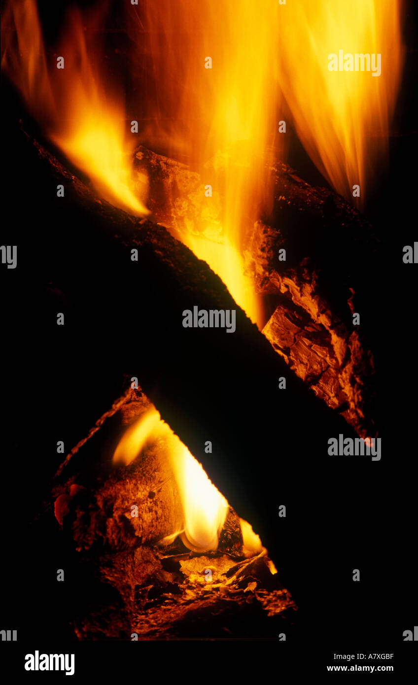 logs fire alight burning Stock Photo - Alamy
