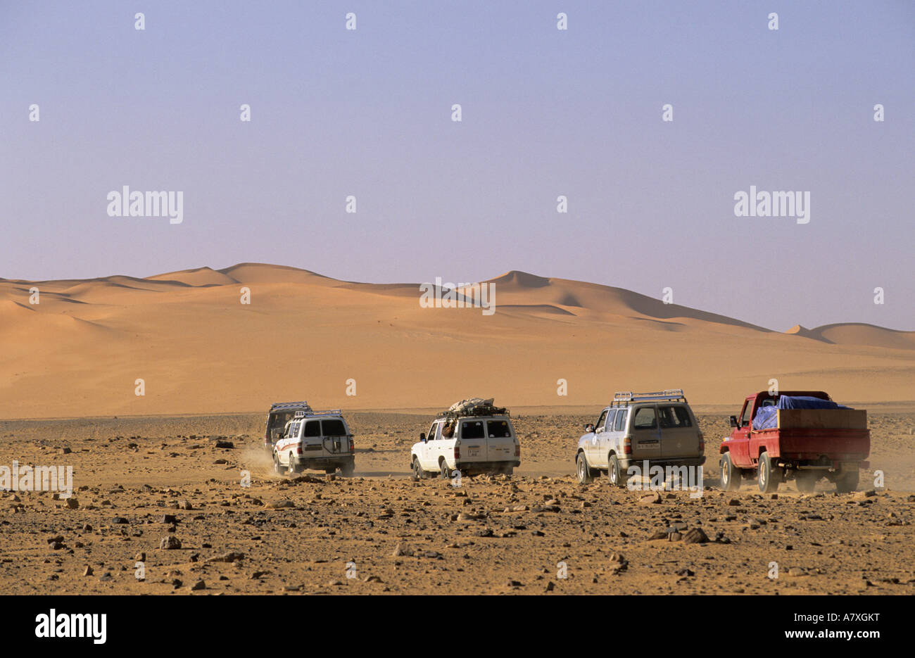 Libya, Fezzan, Sahara desert, Erg Murzuq, Jeeps driving through desert ...