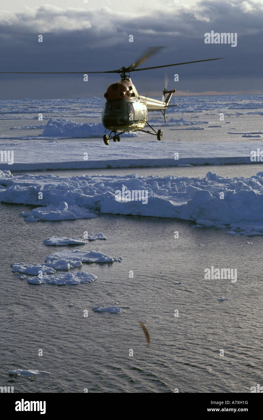 Antarctica, Helicopter over ice flow Stock Photo - Alamy
