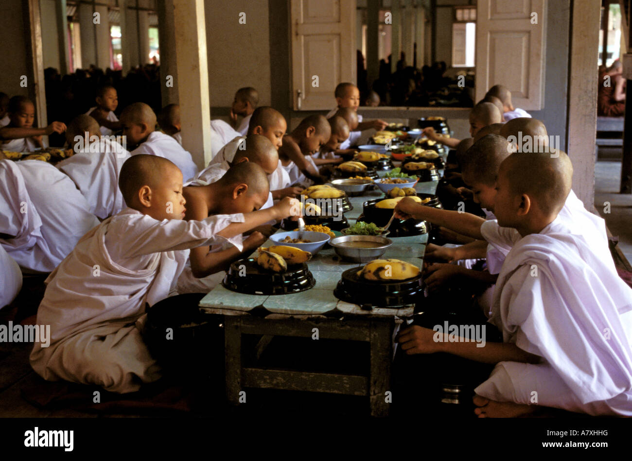 Novice monk eating hi-res stock photography and images - Alamy