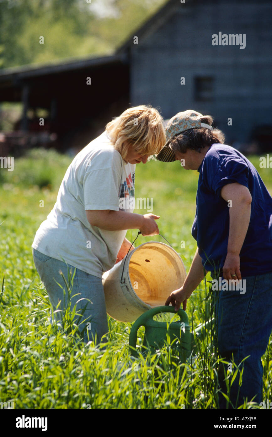Watering can farming water hi-res stock photography and images - Alamy