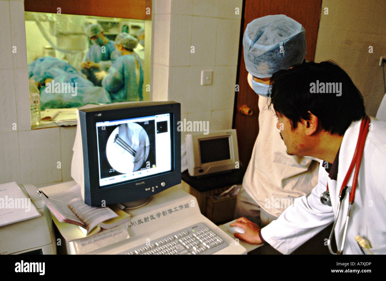 Asia, China, Yunnan Province, Jinghong. Hip surgery in hospital Stock ...