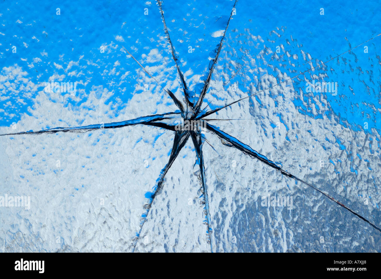 Cracks in ripple / ribbed glass Stock Photo - Alamy