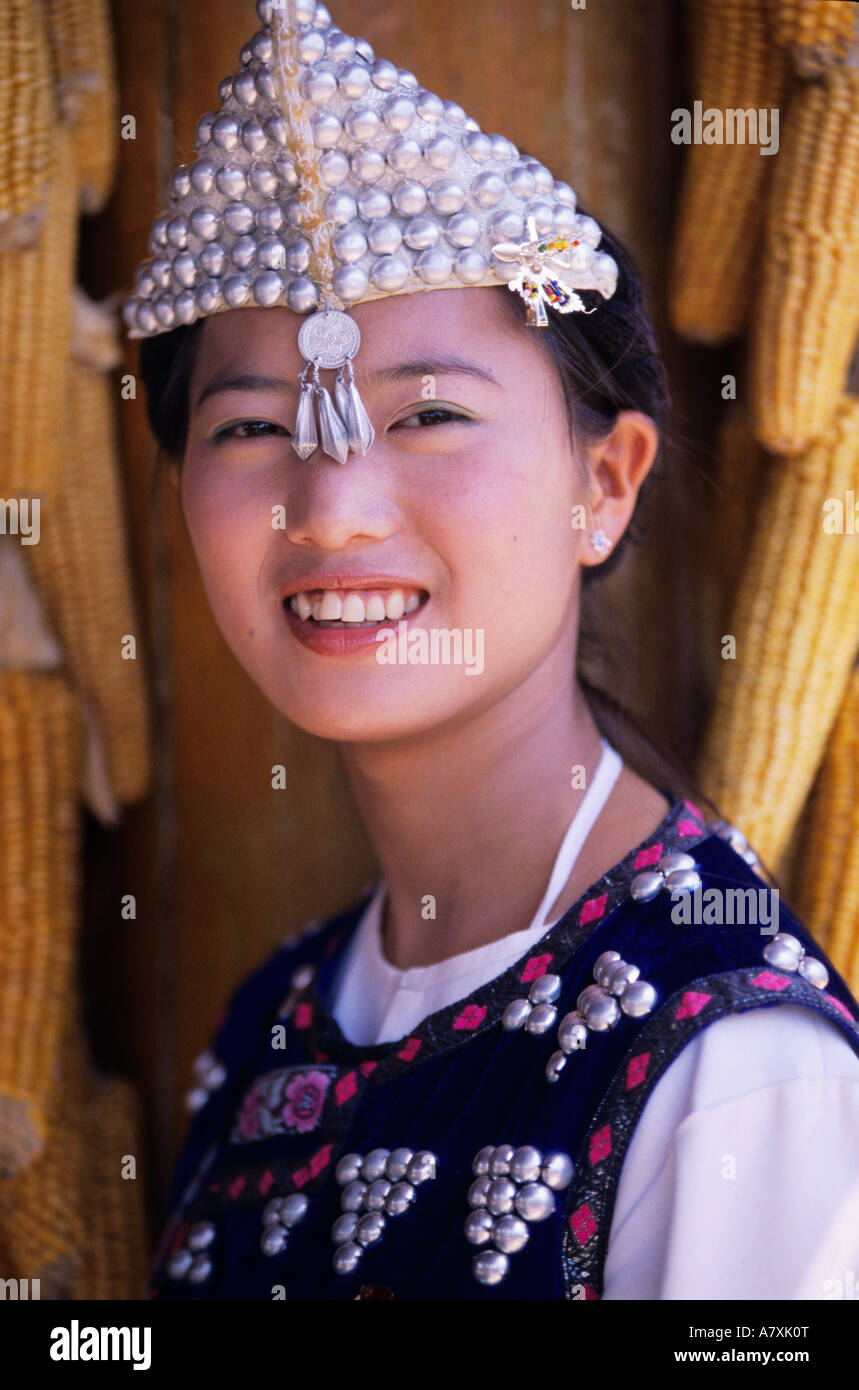 Asia, China, Yunnan Province. Young Hani minority woman in traditional ...