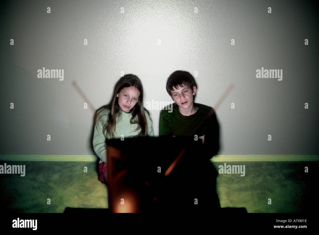 Watching tv zoned out hi-res stock photography and images - Alamy