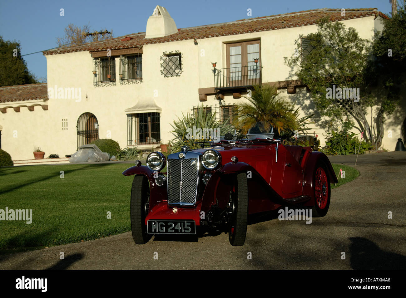 RED MG VINTAGE SPORTS CAR ON DRIVE OF BEAUTIFUL HOUSE Stock Photo - Alamy