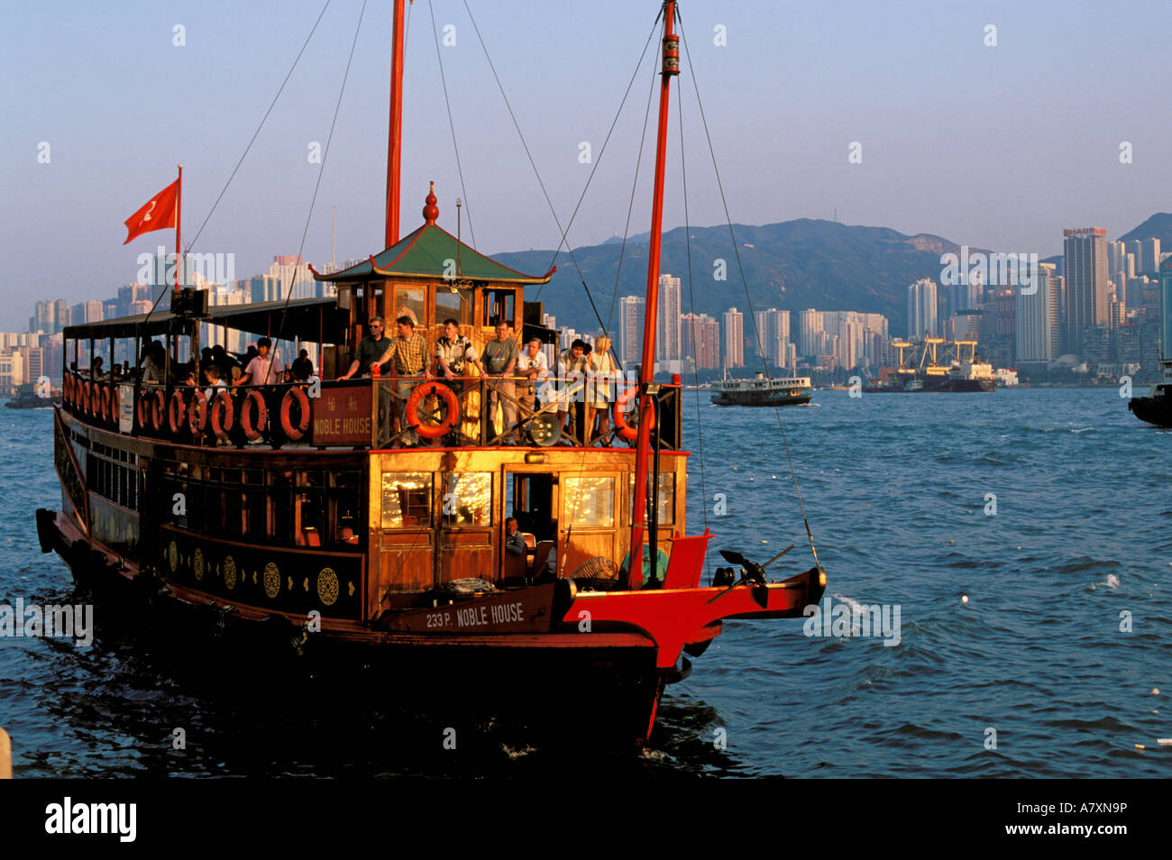 Asia, China, Hong Kong. Tourist boat in Hong Kong Harbor Stock Photo ...