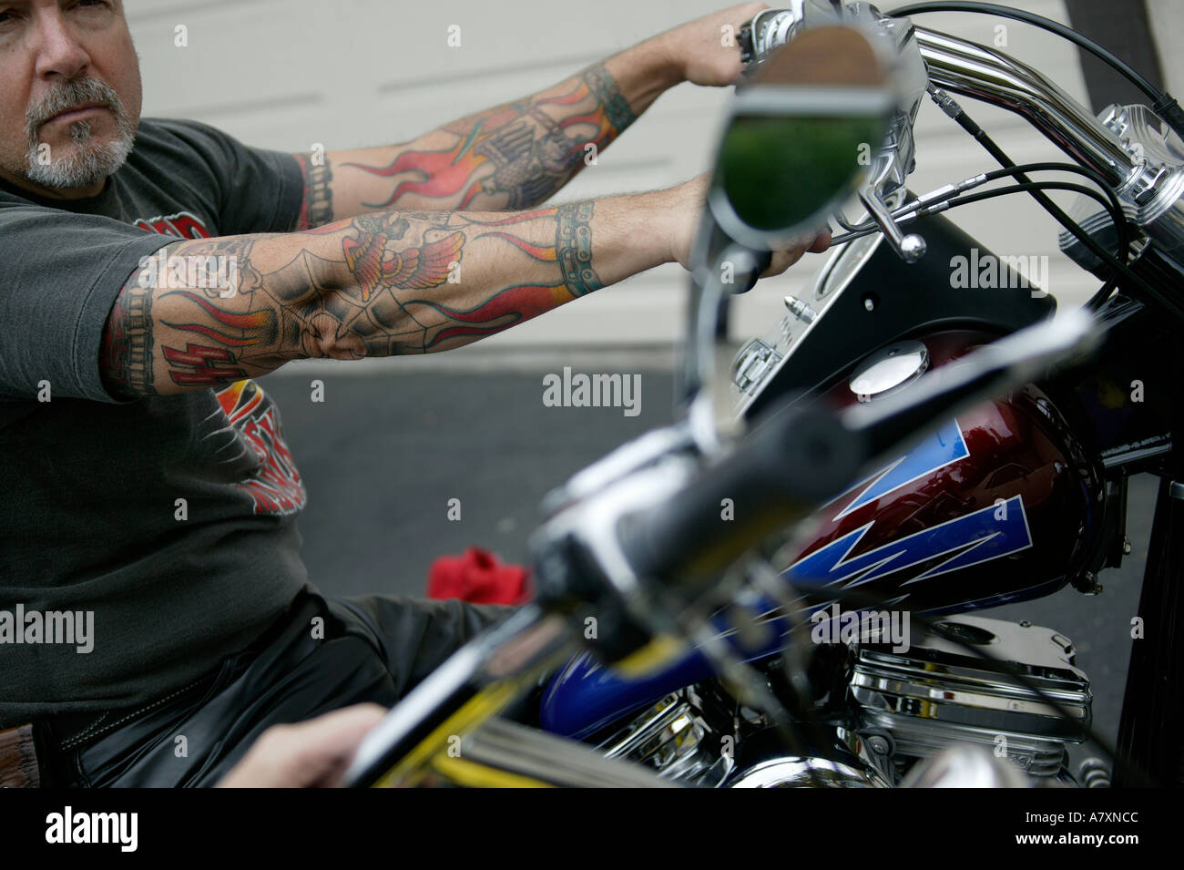 MAN RIDING MOTORCYCLE Stock Photo - Alamy