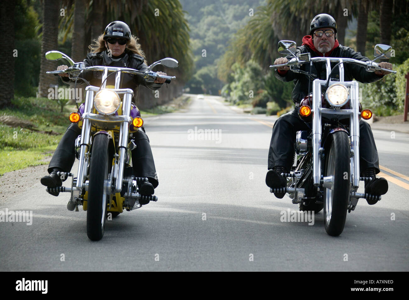 MAN AND WOMAN WITH MOTORCYCLES Stock Photo - Alamy