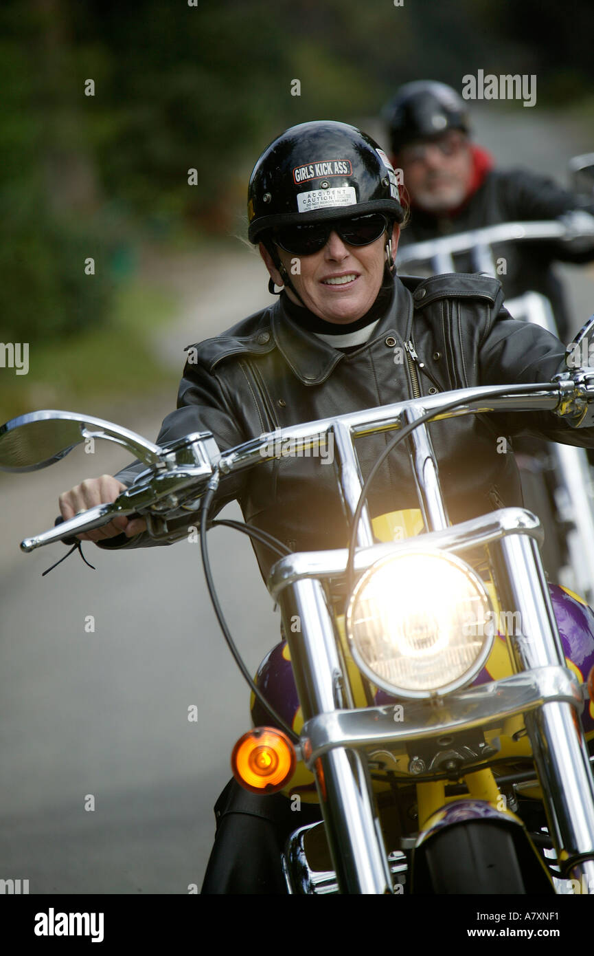 MAN AND WOMAN RIDING MOTORCYCLES Stock Photo - Alamy