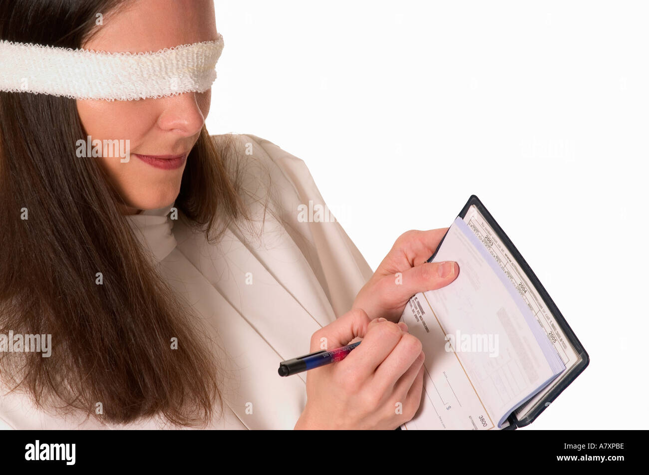 Woman writing check shirt hi-res stock photography and images - Alamy