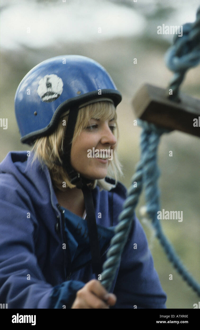 Girl on rope ladder Stock Photo - Alamy