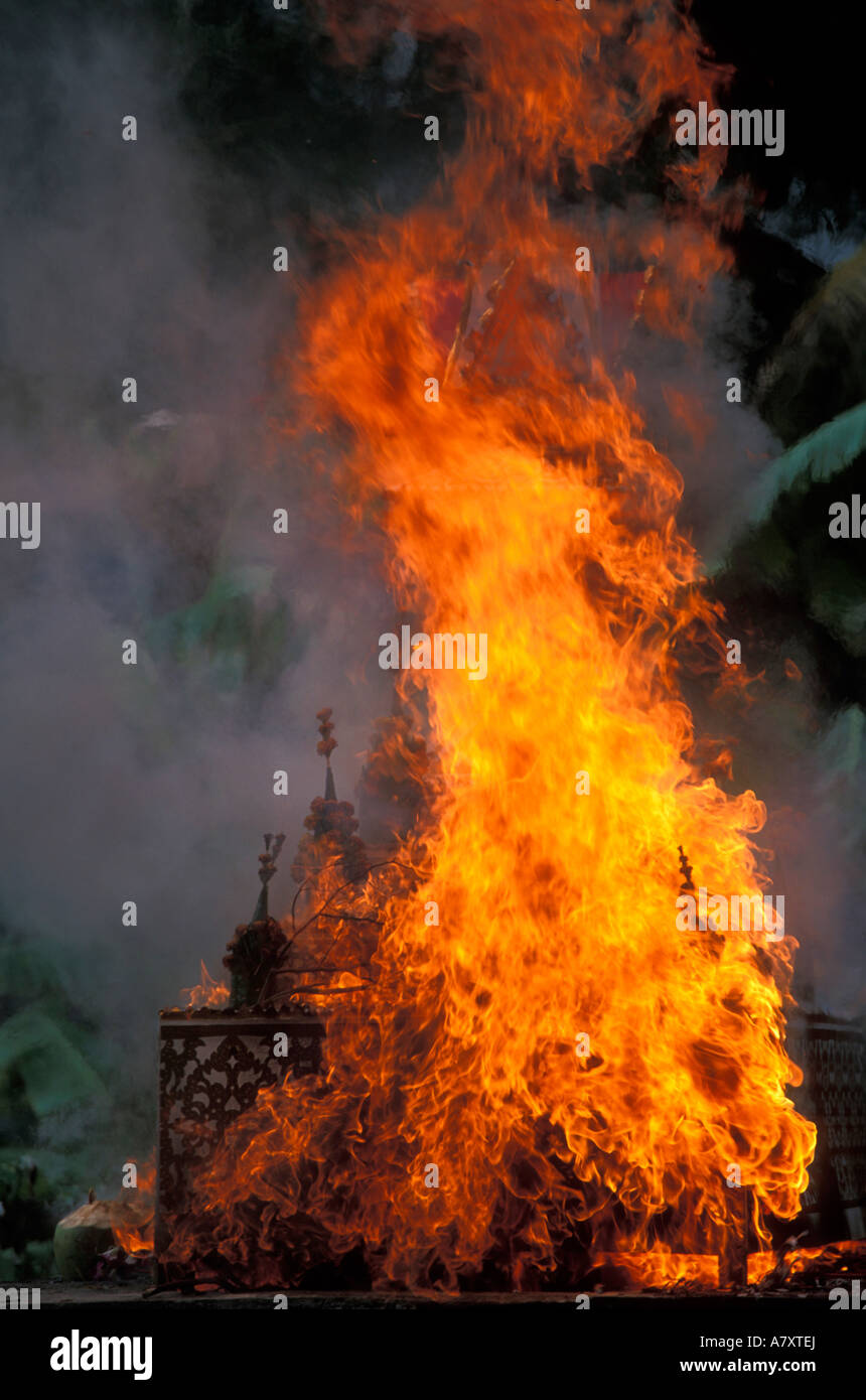 Asia, Laos, Chum Chang, Flames from funeral pyre during young woman's ...