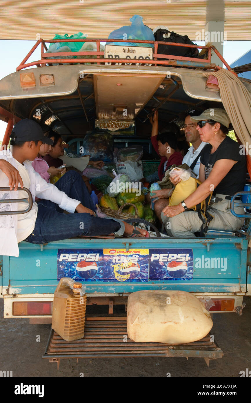Weary caucasian travellers in a loaded songthaew, Pakse, Laos Stock ...