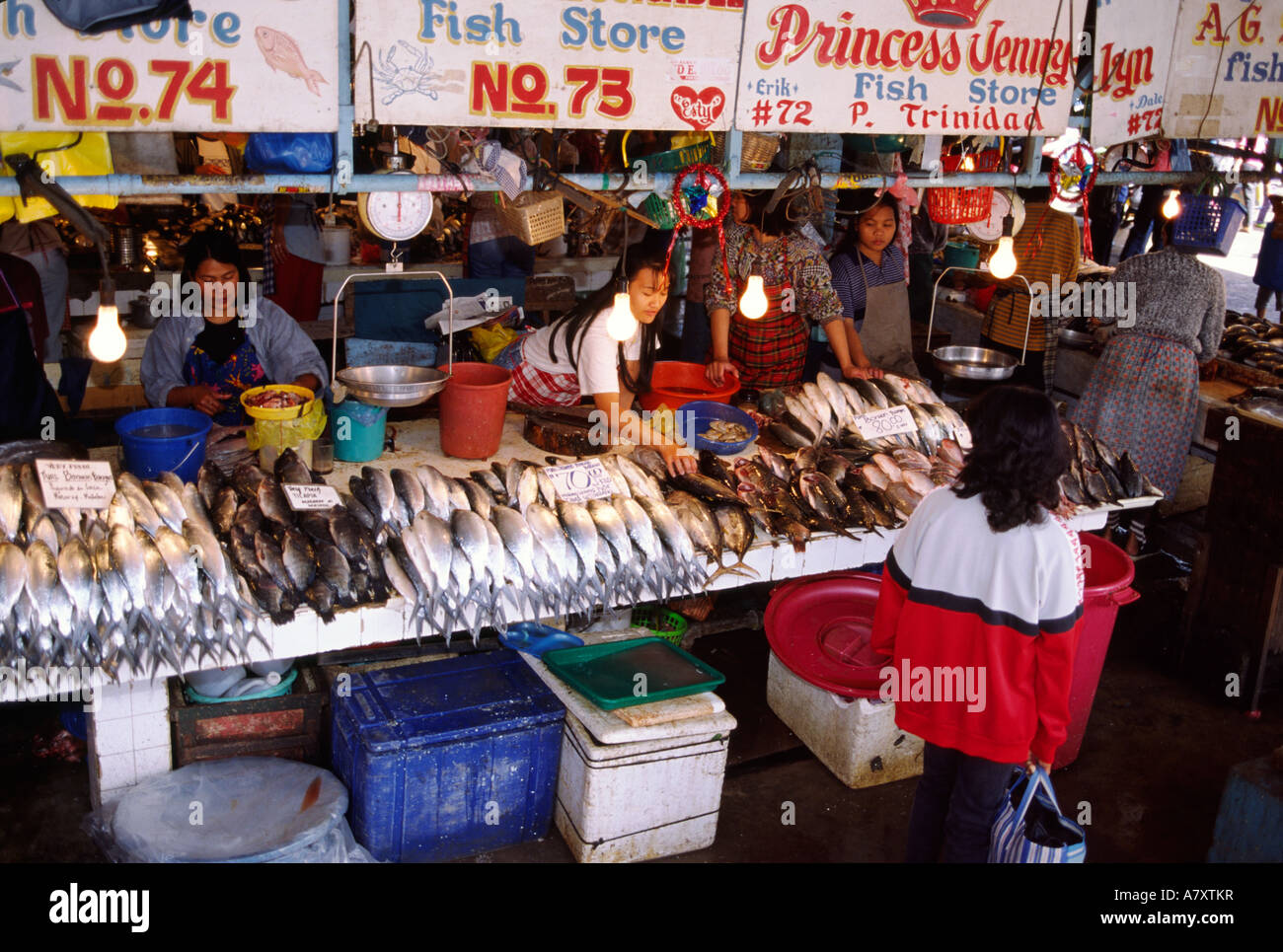 Asia, Philippines, Benguet Province, Baguio City. Fish stores at the ...