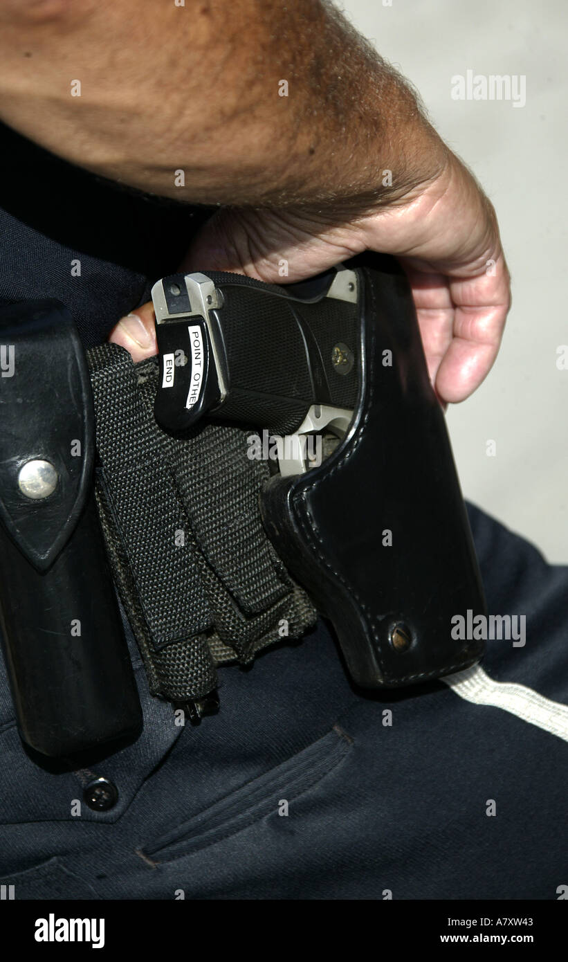 Policeman with gun hi-res stock photography and images - Alamy