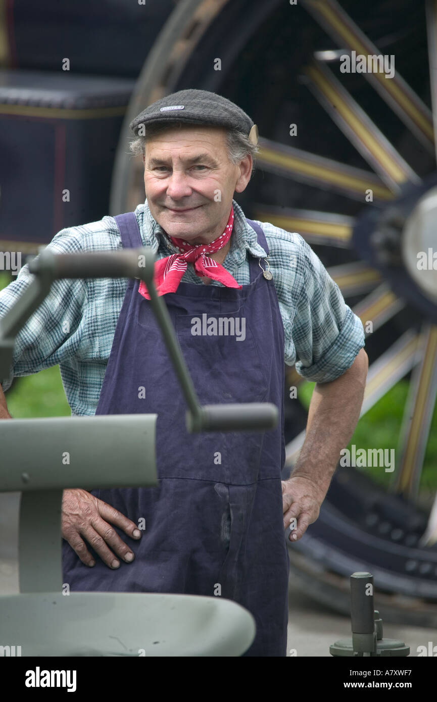 MAN WEARING TRADITIONAL MANUAL WORKER CLOTHES Stock Photo - Alamy