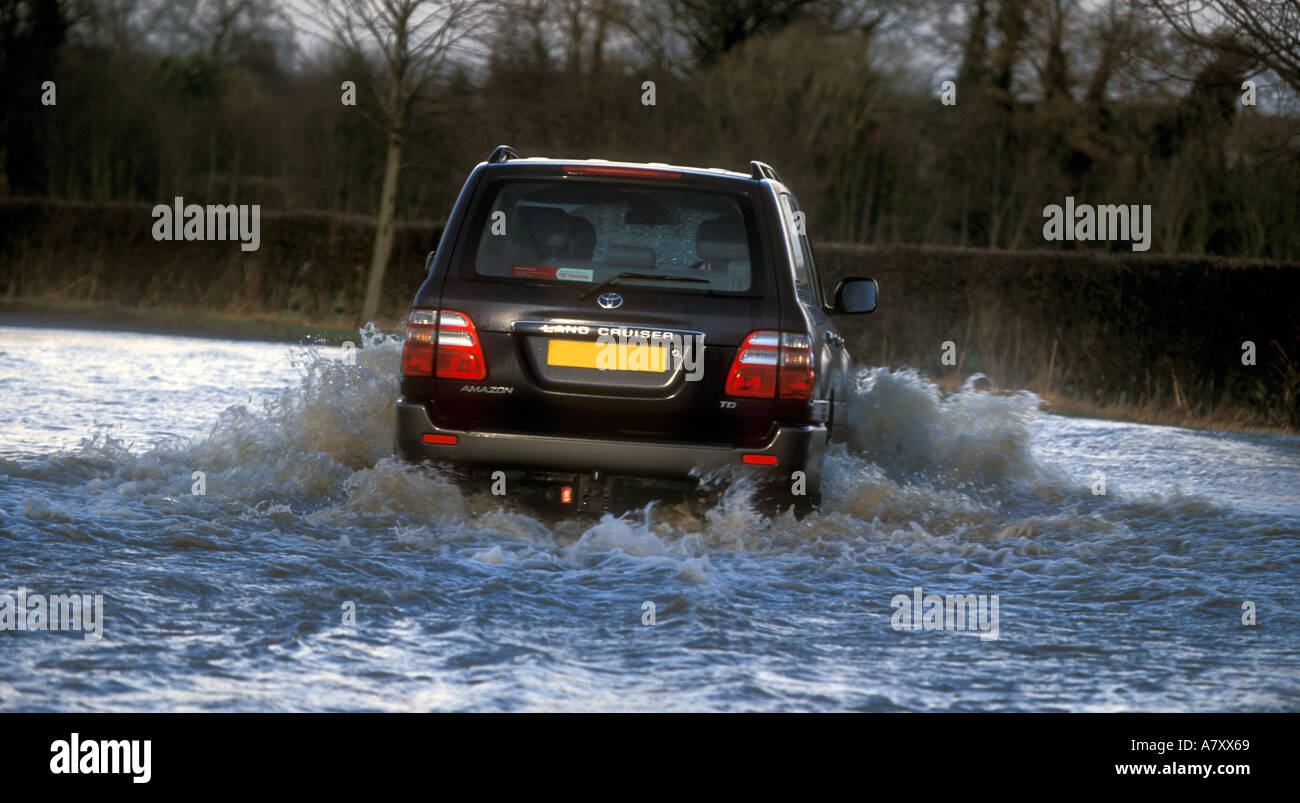 Vehicle going through flood hi-res stock photography and images - Alamy