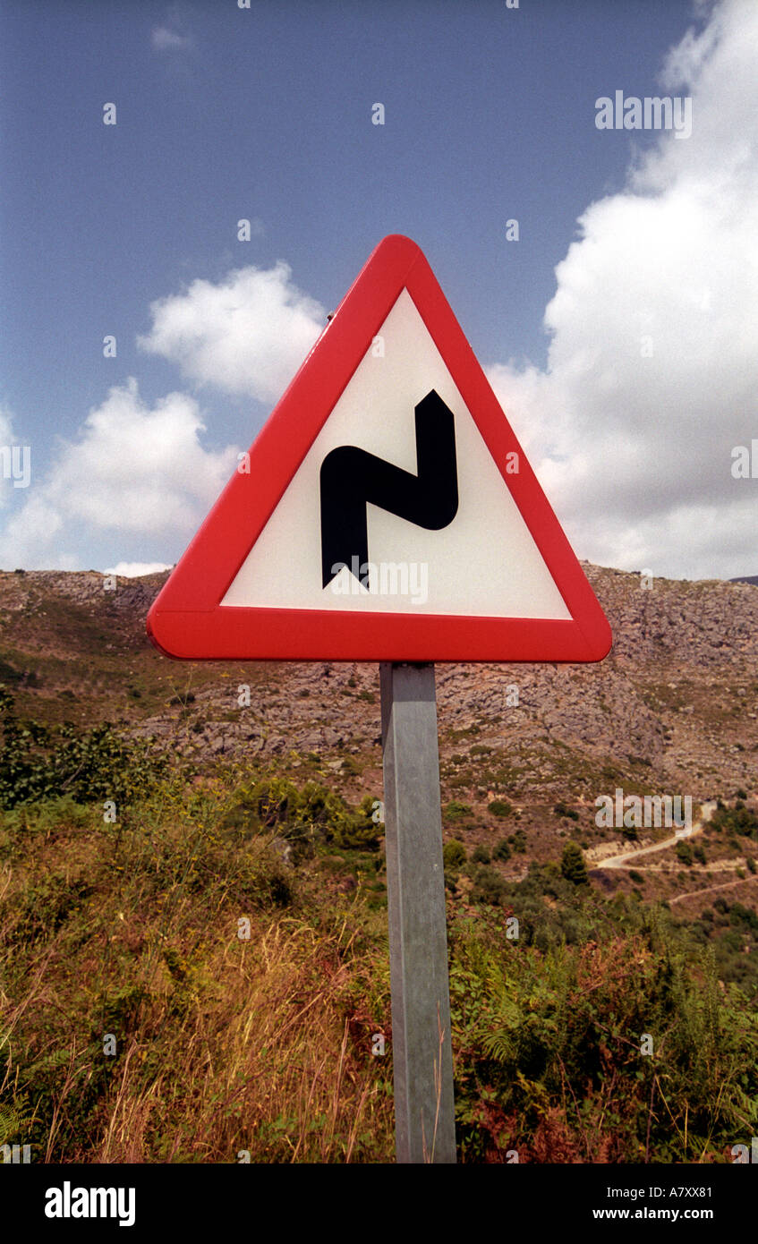 Double bend sign in Spain Europe Stock Photo - Alamy