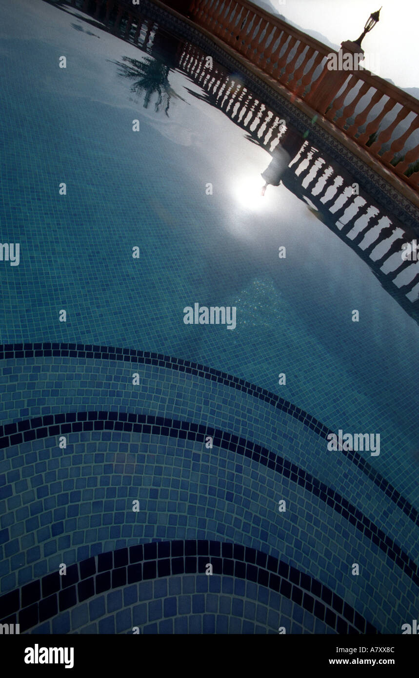 Swimming pool reflections of balcony Stock Photo - Alamy