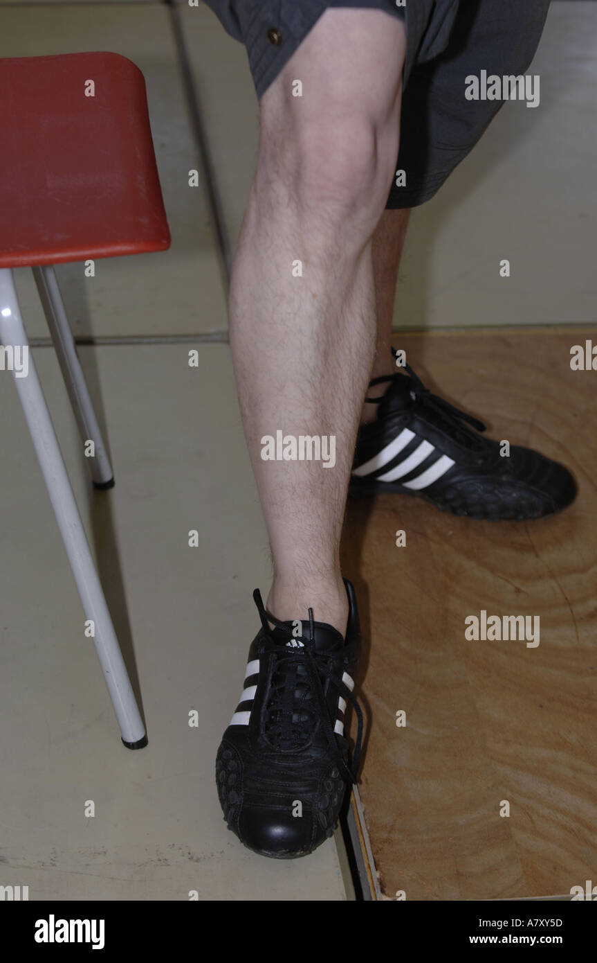 man having legs waxed for charity leg male man white caucasian colour ...