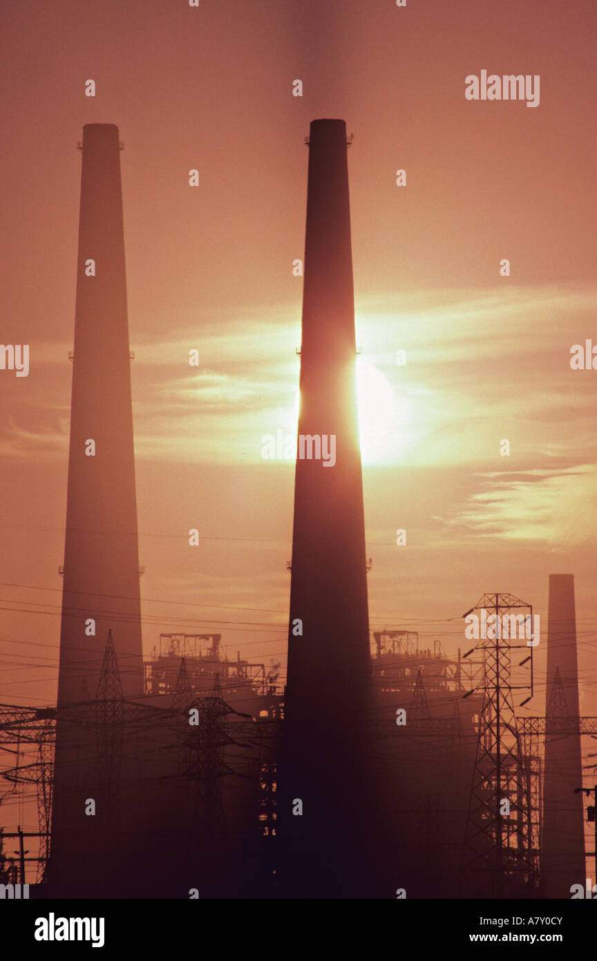 Industrial stacks at sunset Stock Photo - Alamy