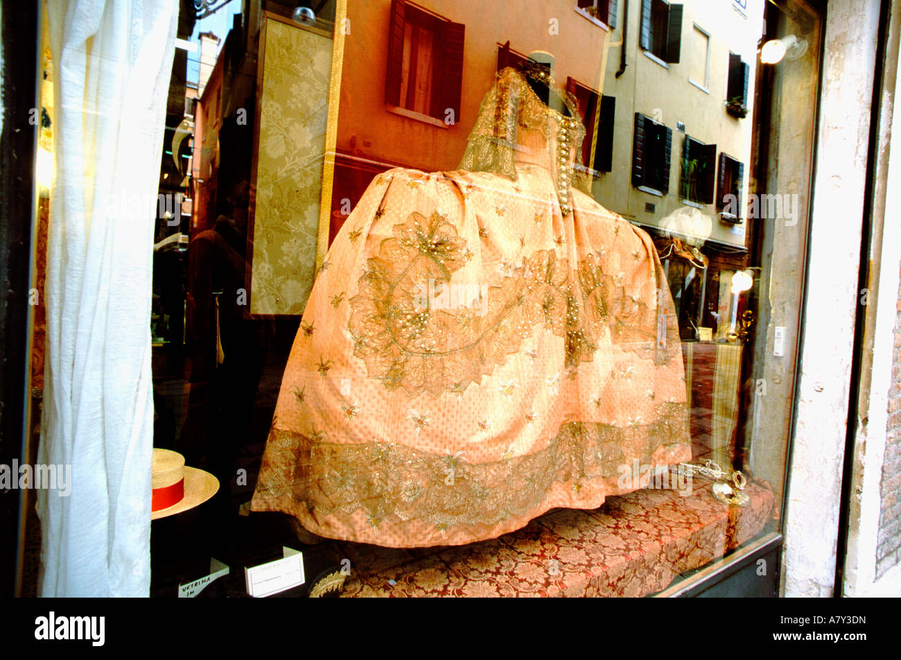Europe, Italy, Venice. Store window of dress maker & costume shop ...
