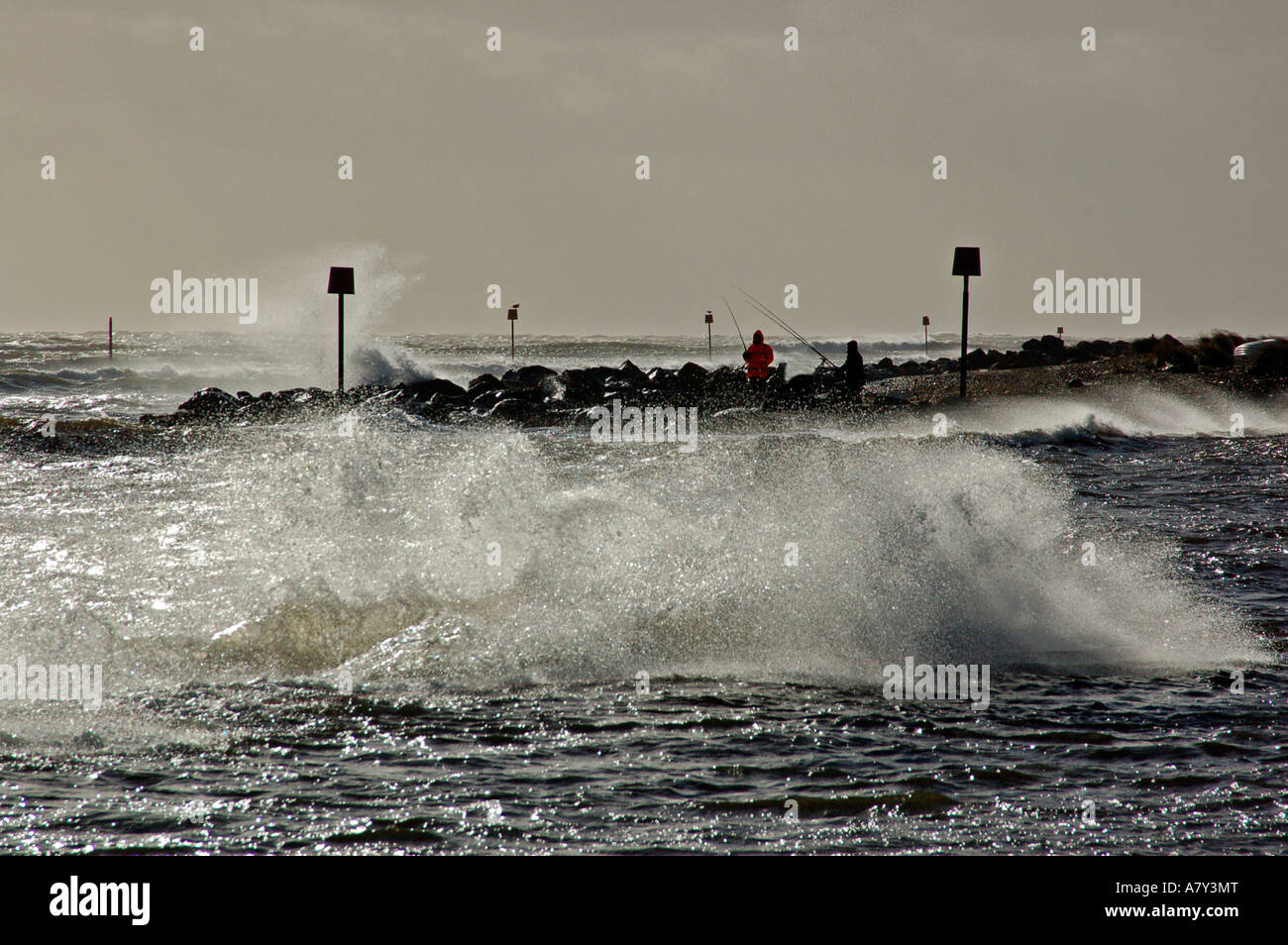 Storm waves and breakwaters Stock Photo - Alamy