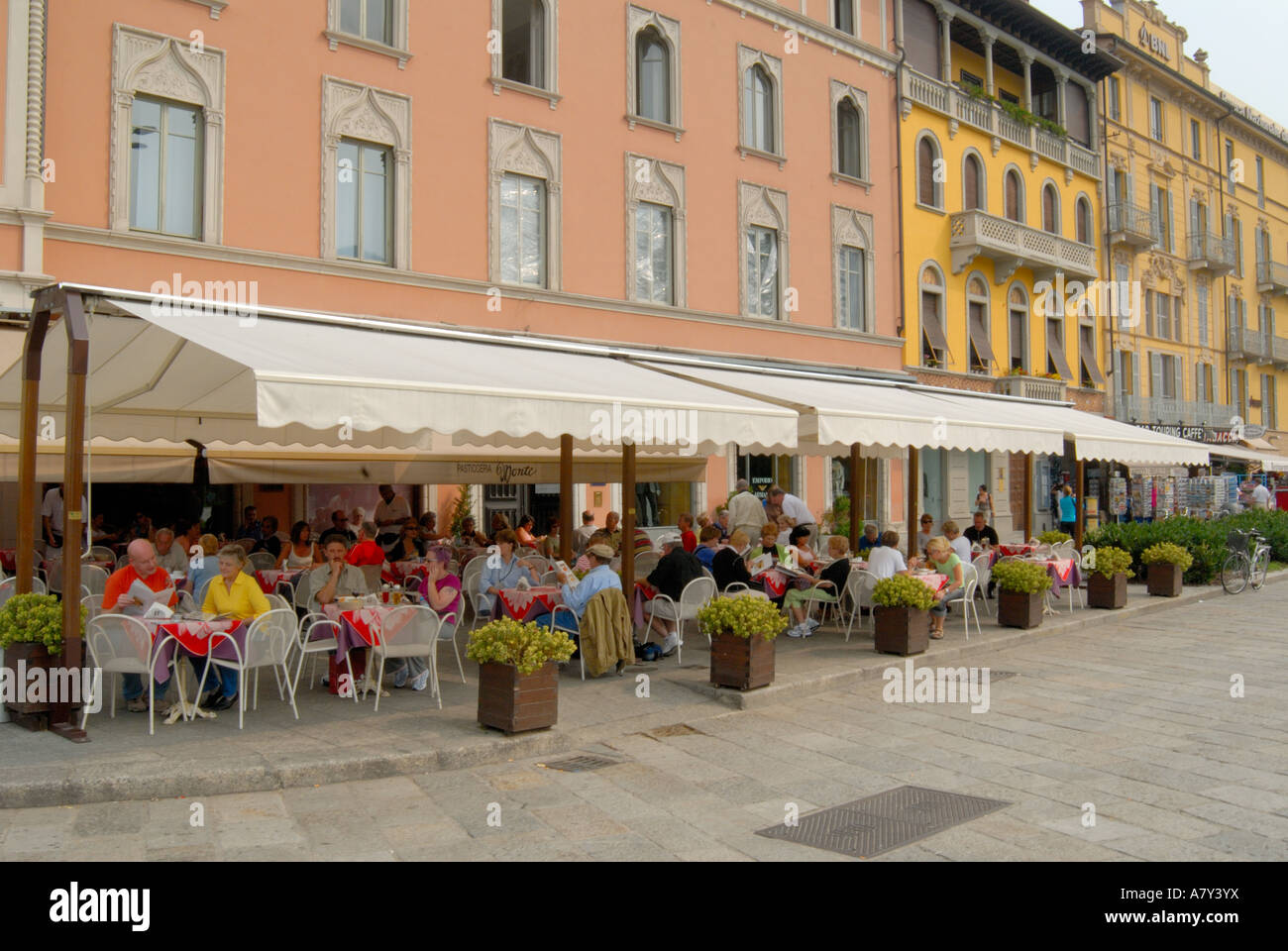 Italy, Lake Como, sidewalk café in Como Stock Photo - Alamy