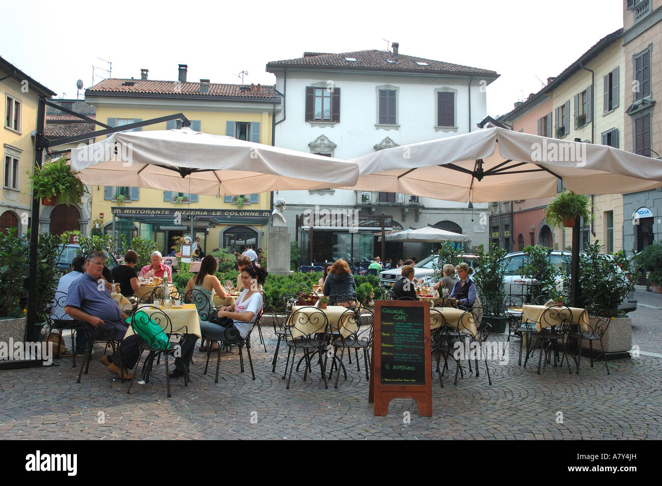 Italy, Lake Como, sidewalk café in Como Stock Photo - Alamy