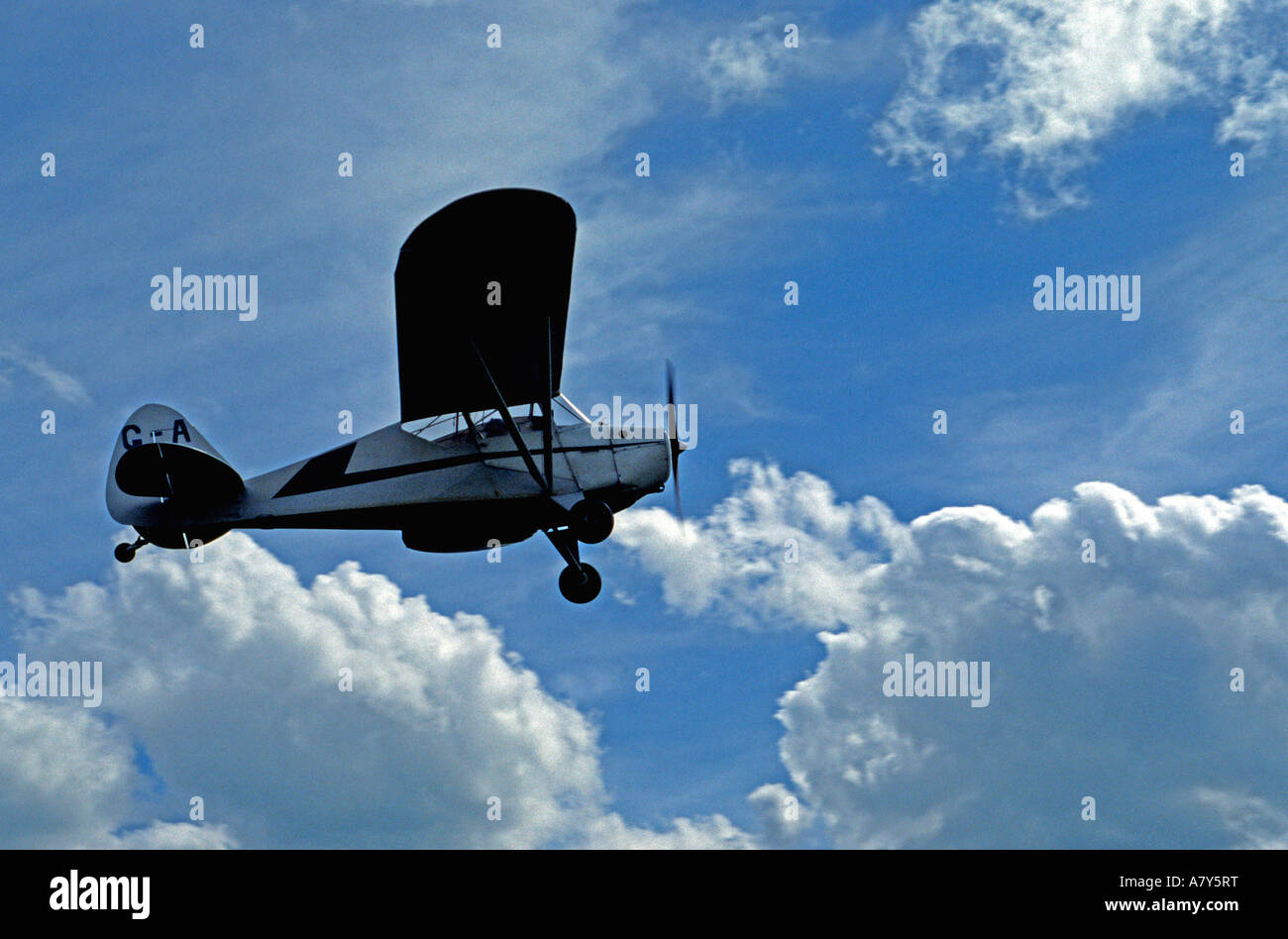 Single seater high wing light aircraft in flight Stock Photo - Alamy