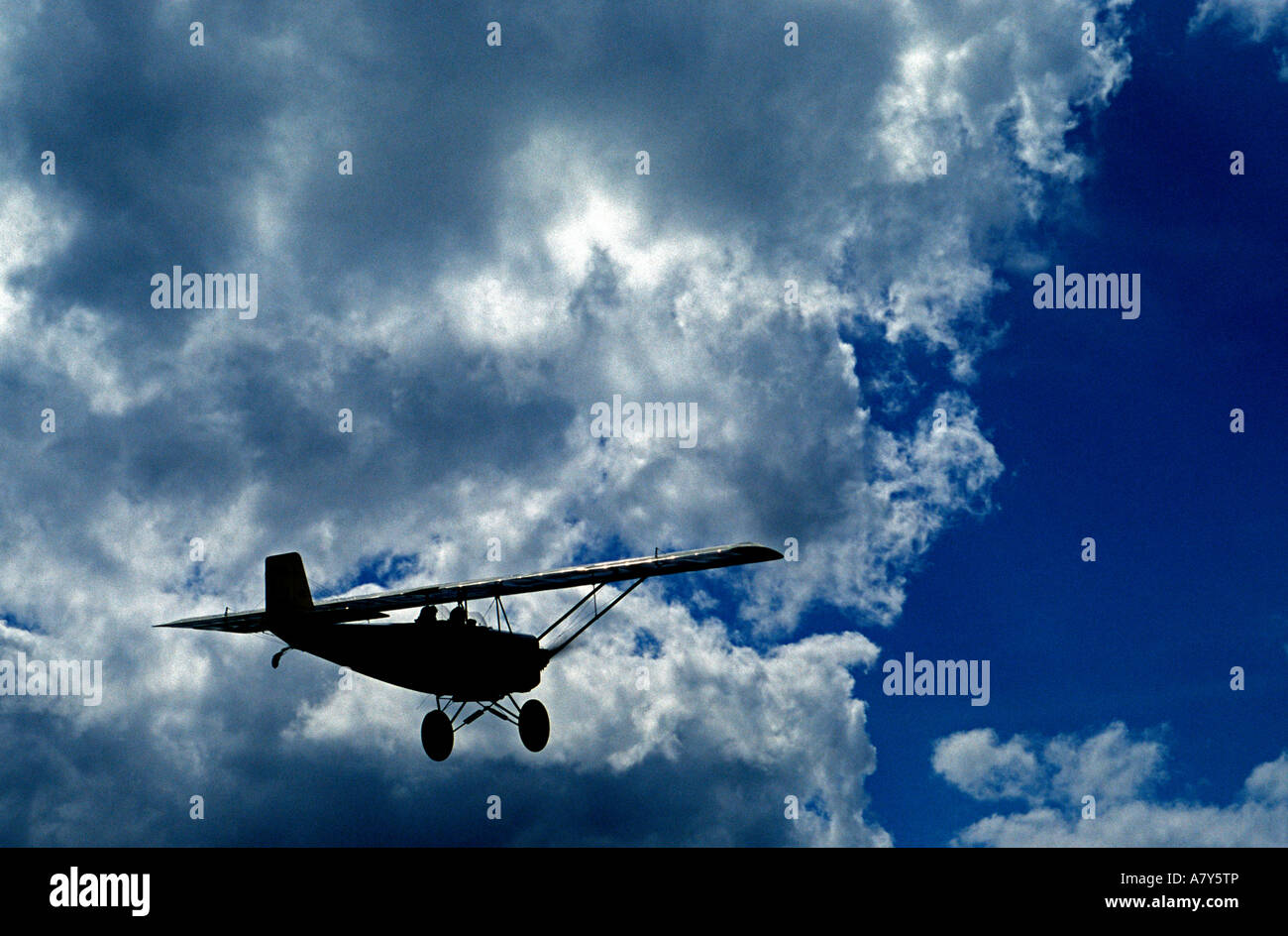 Single seater high wing light aircraft in flight Stock Photo - Alamy