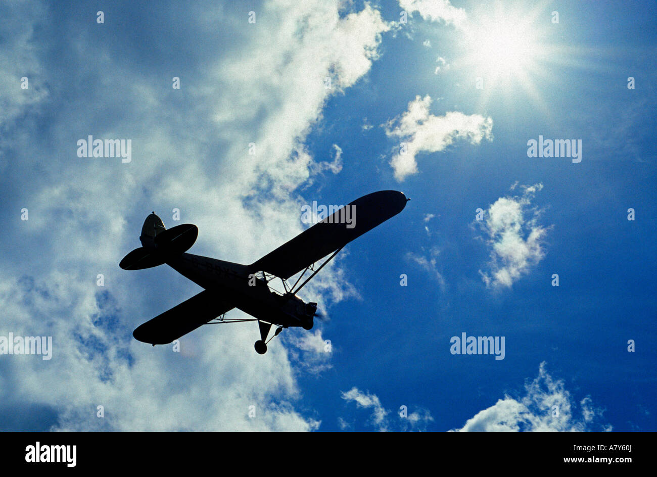 Single seater high wing light aircraft in flight Stock Photo - Alamy