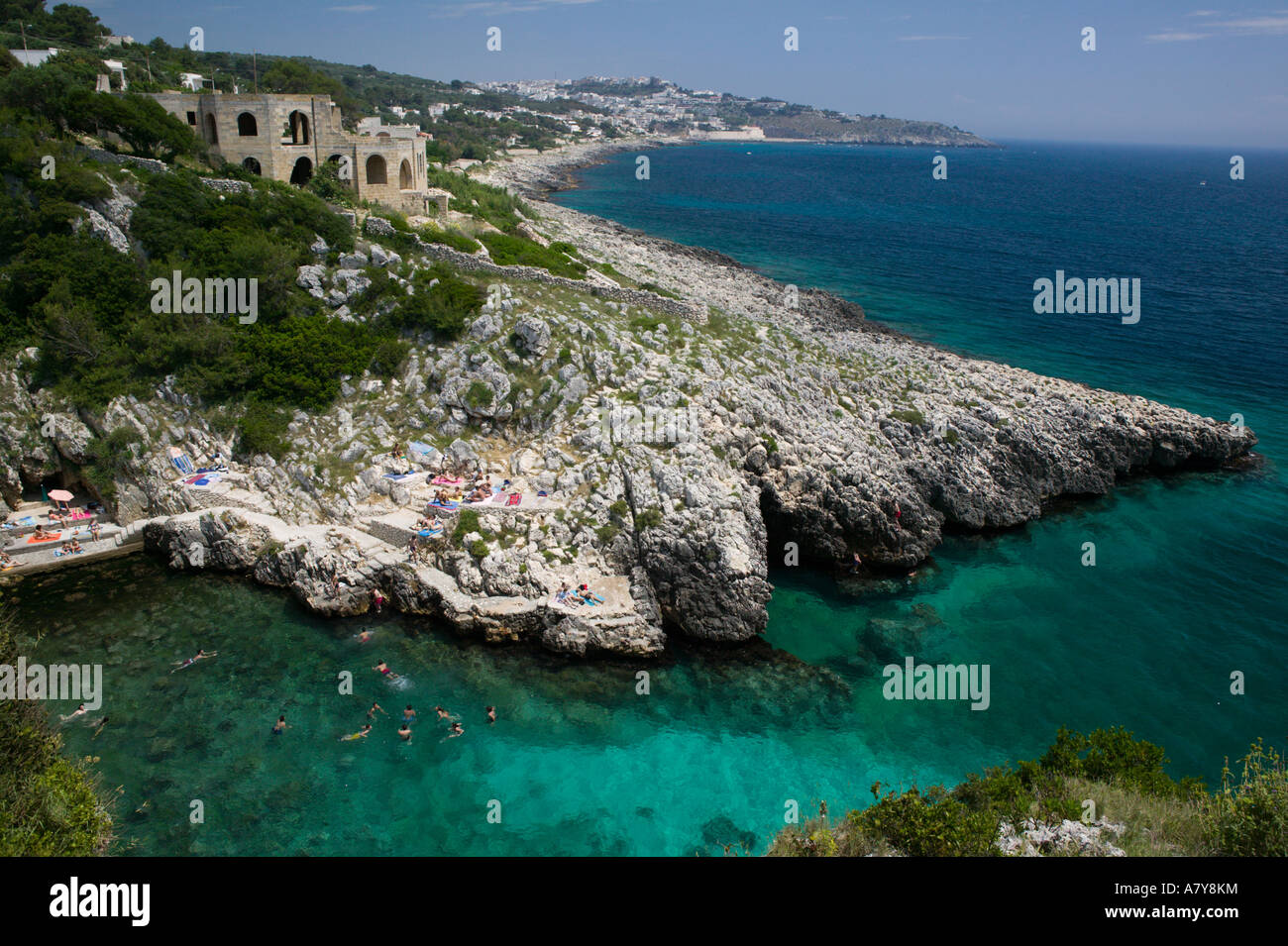 Italy, Puglia, Marina di Andrano, Swimming in sheltered cove Stock ...