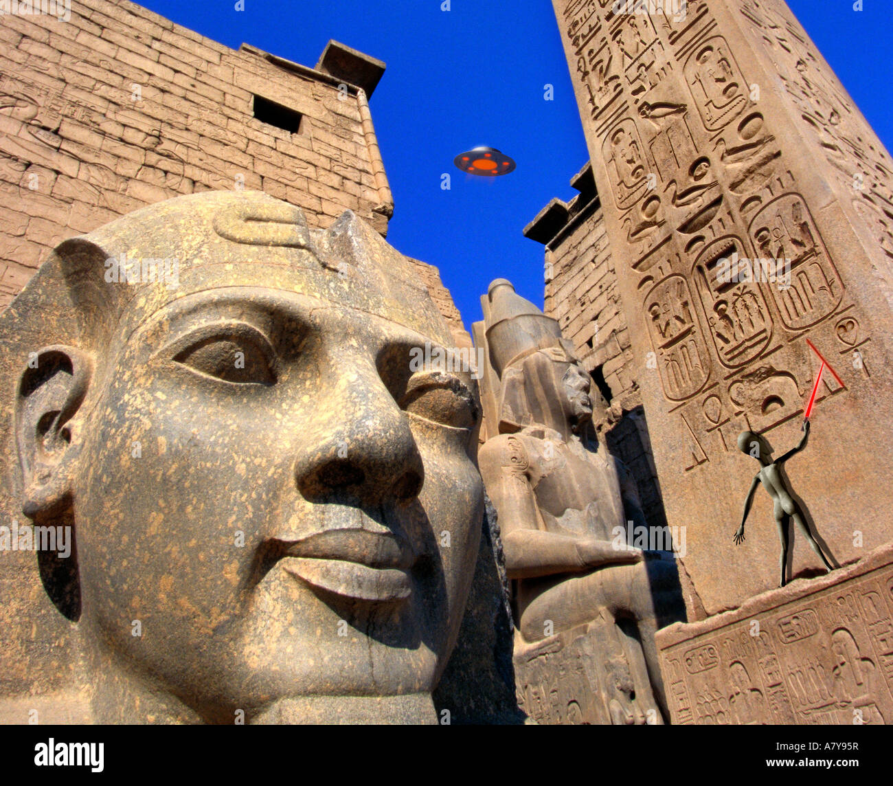 Alien worker in Egypt with UFO Stock Photo - Alamy