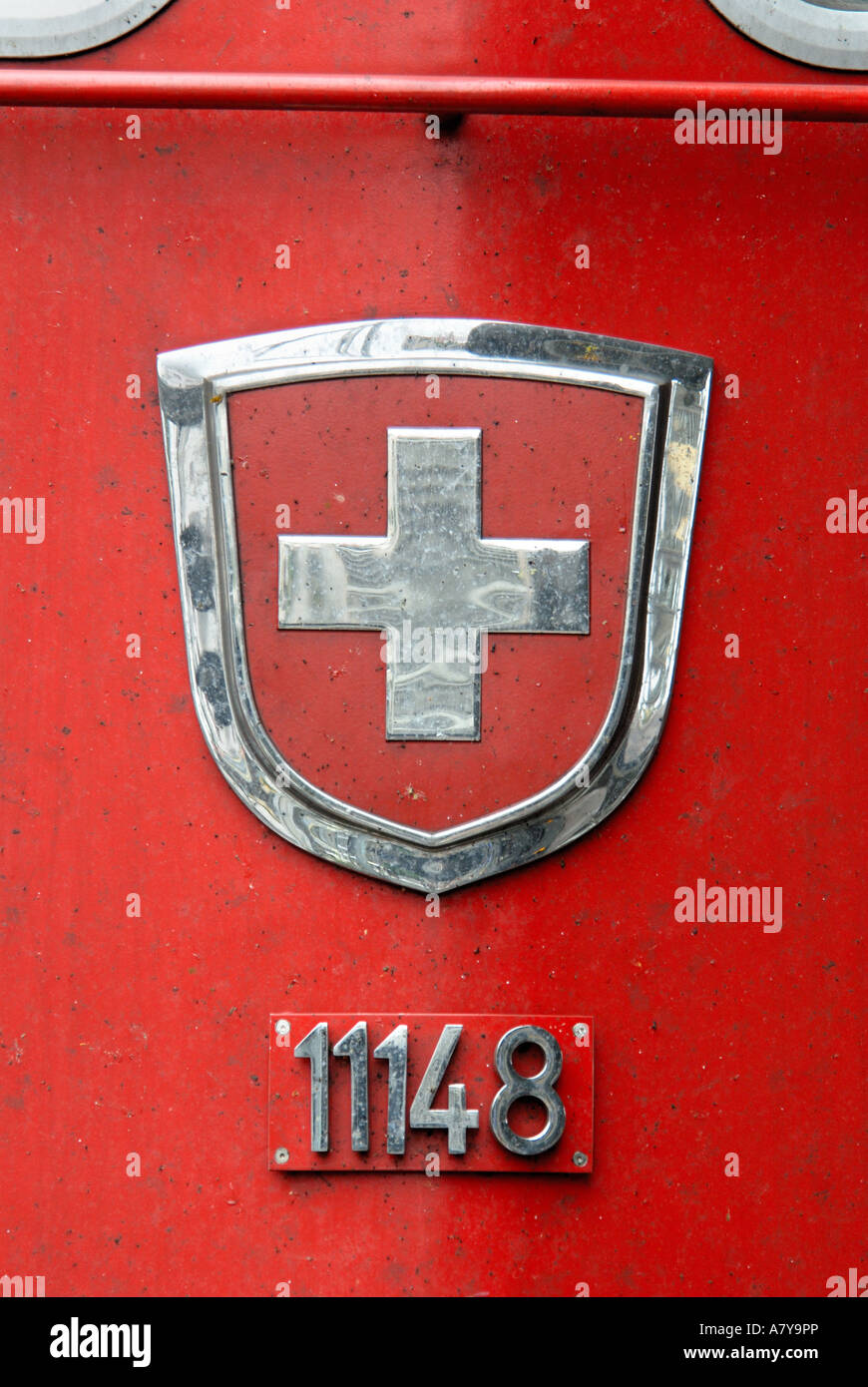 Switzerland, Locarno, Lake Maggiore, Swiss symbol on train engine Stock ...