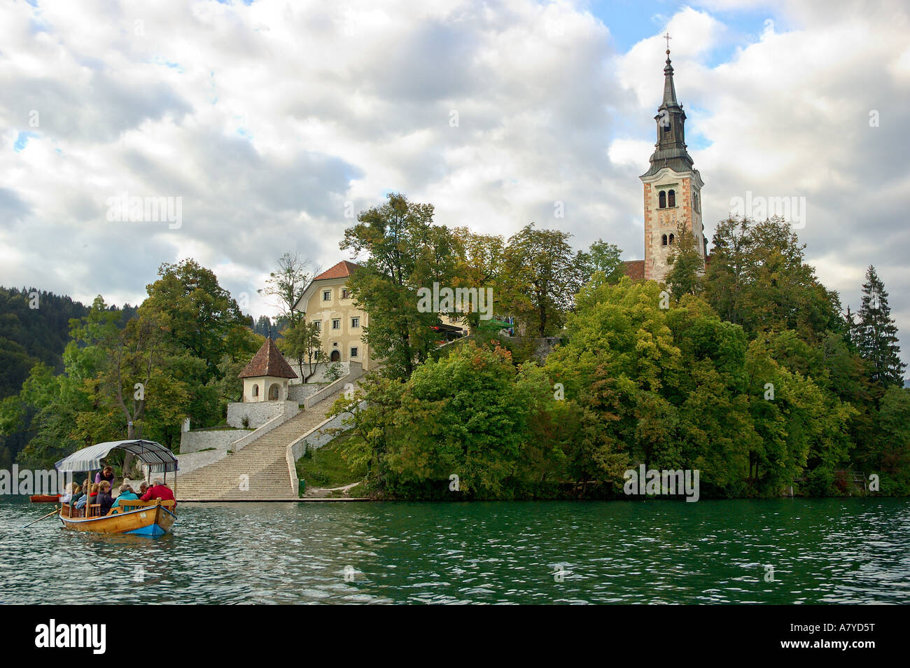Slovenia, Bled, Lake Bled, pletna boat and Bled Island chapel Stock ...