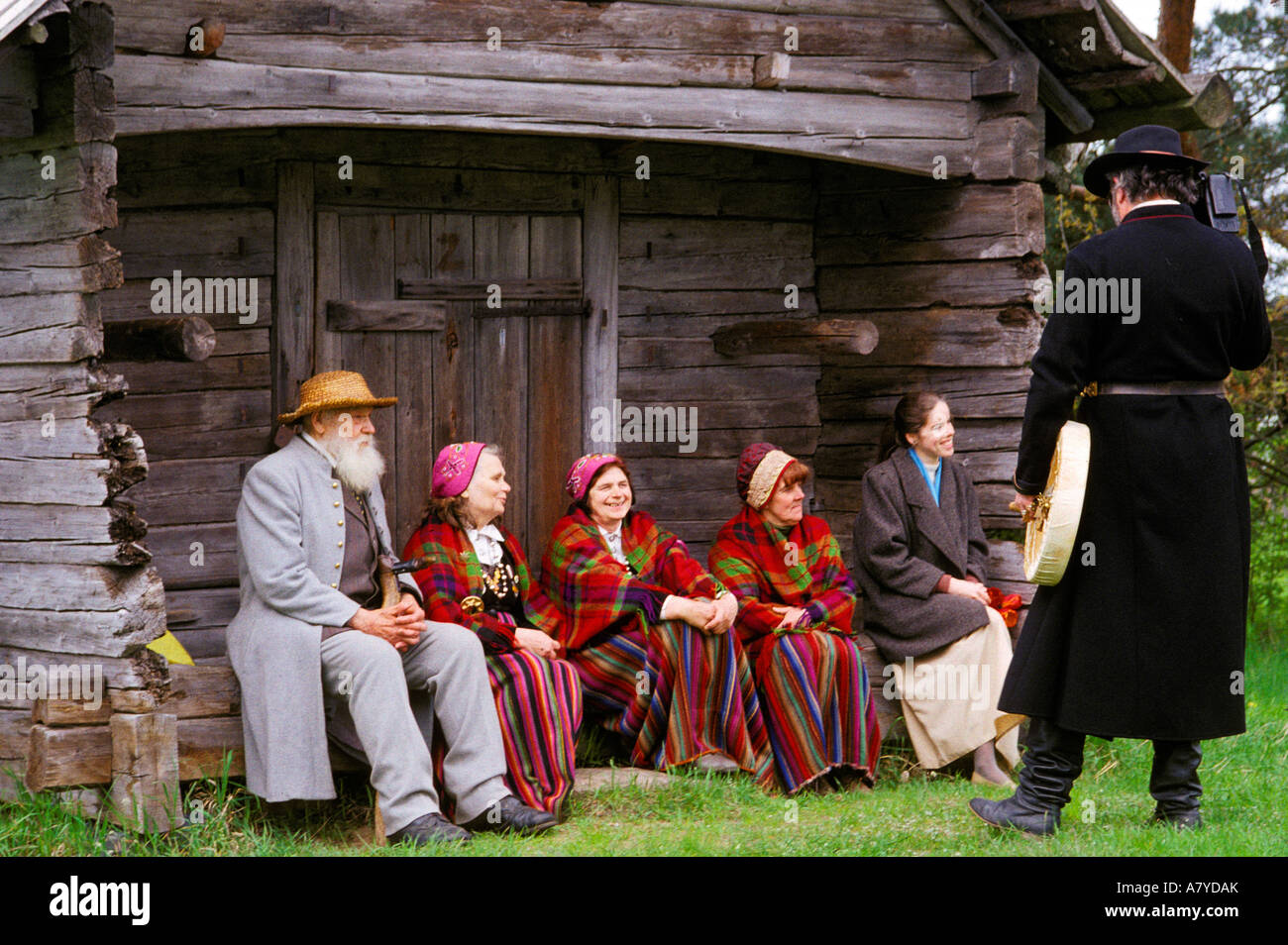 Latvians in traditional costume at the Open Air Ethnographic Museum ...