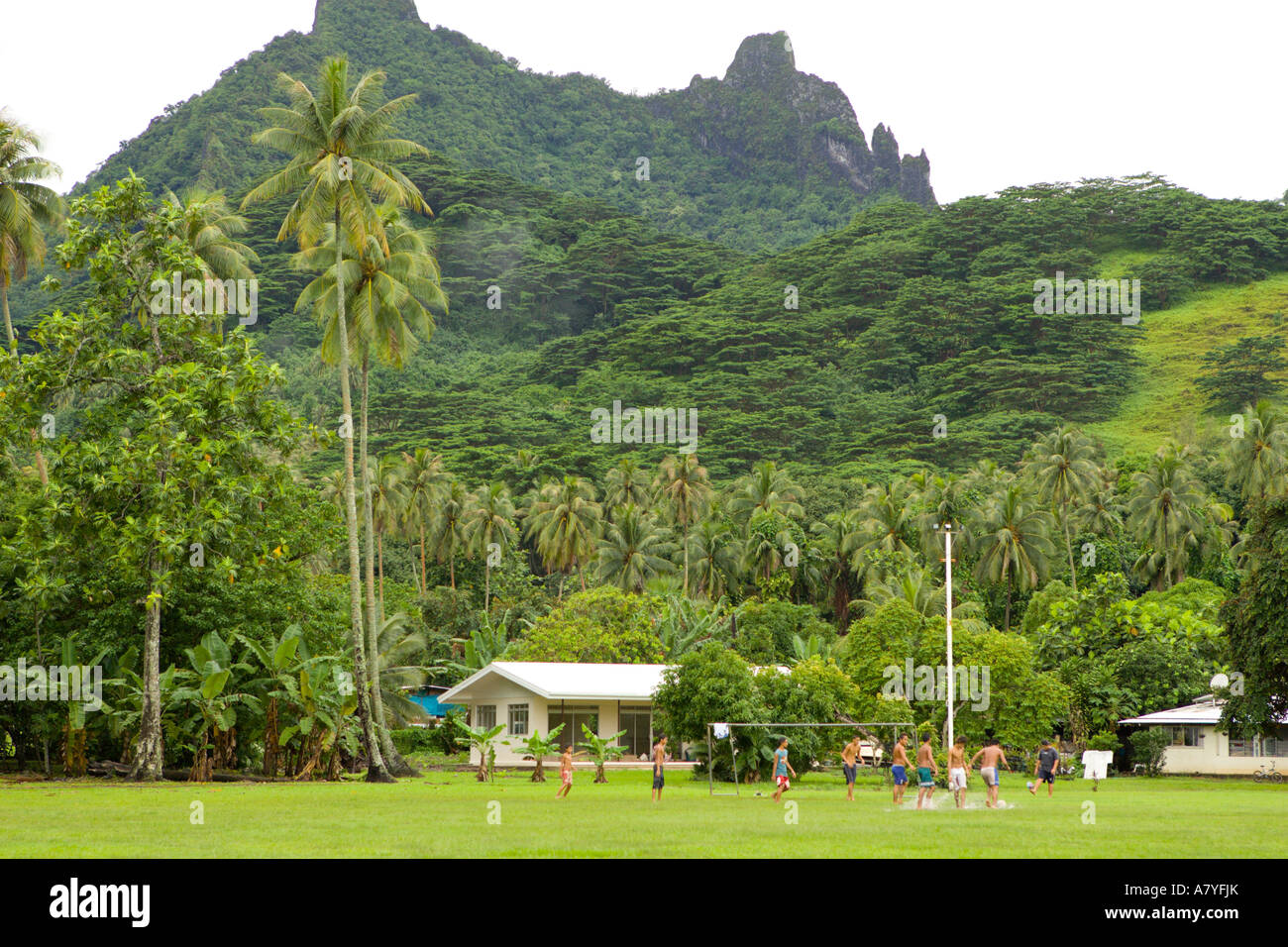 Local boys playing soccer Moorea, Society Islands, French Polynesia ...