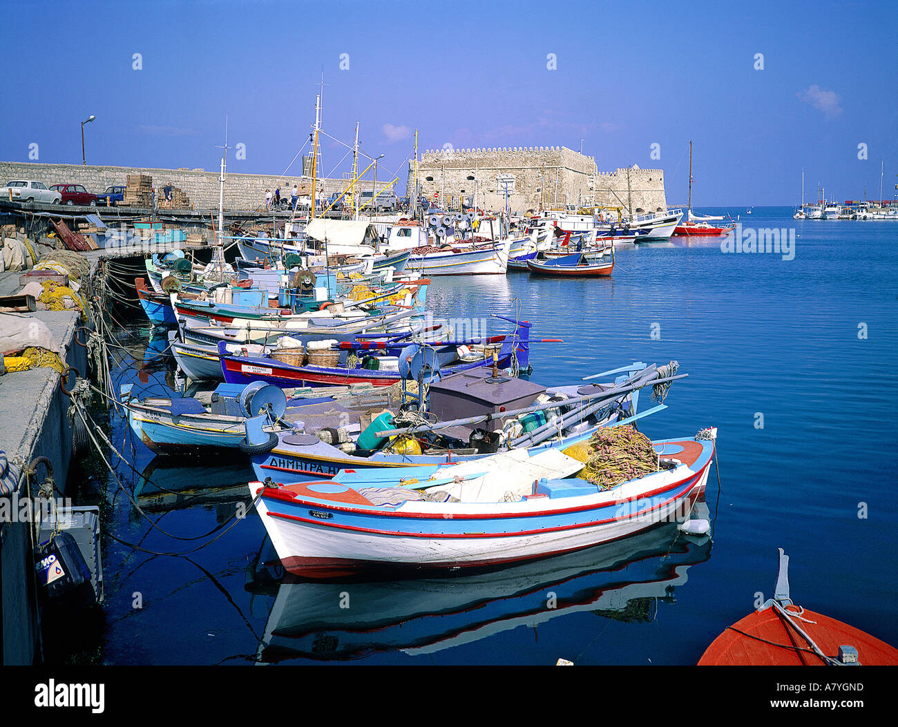 Greece, Crete island, Heraklion harbour and its coloured boats Stock ...