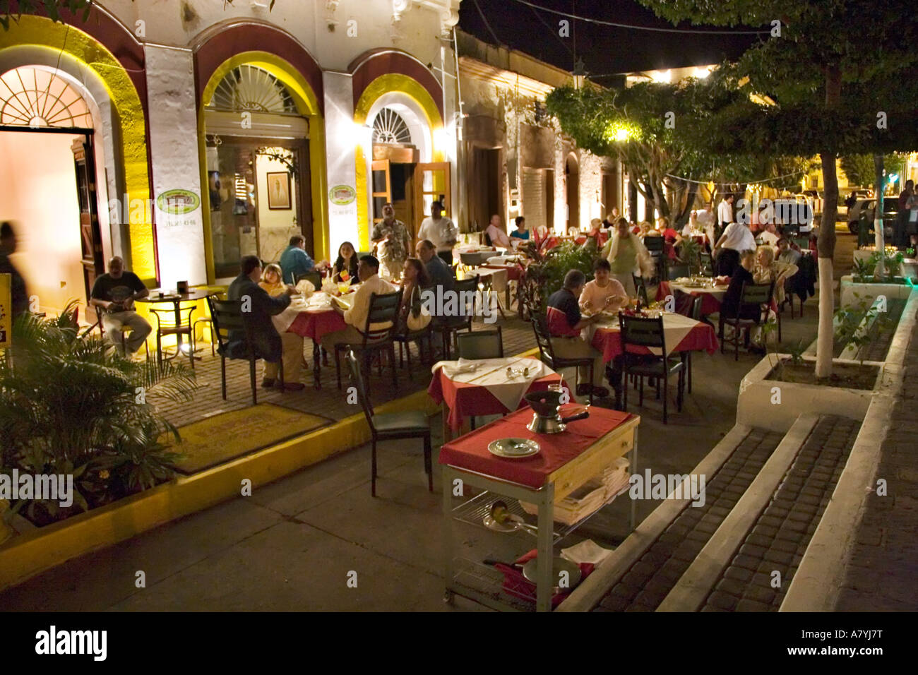 North America, Mexico, Mazatlan. Restaurant scene at night on the ...