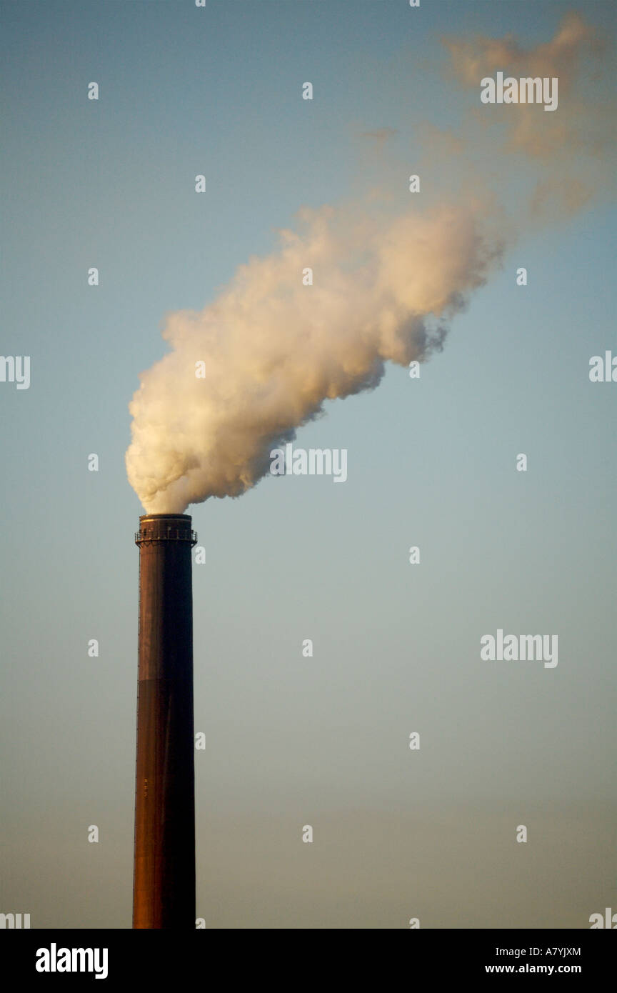 Smokestack of a coal fired powerplant emitting smoke Stock Photo - Alamy