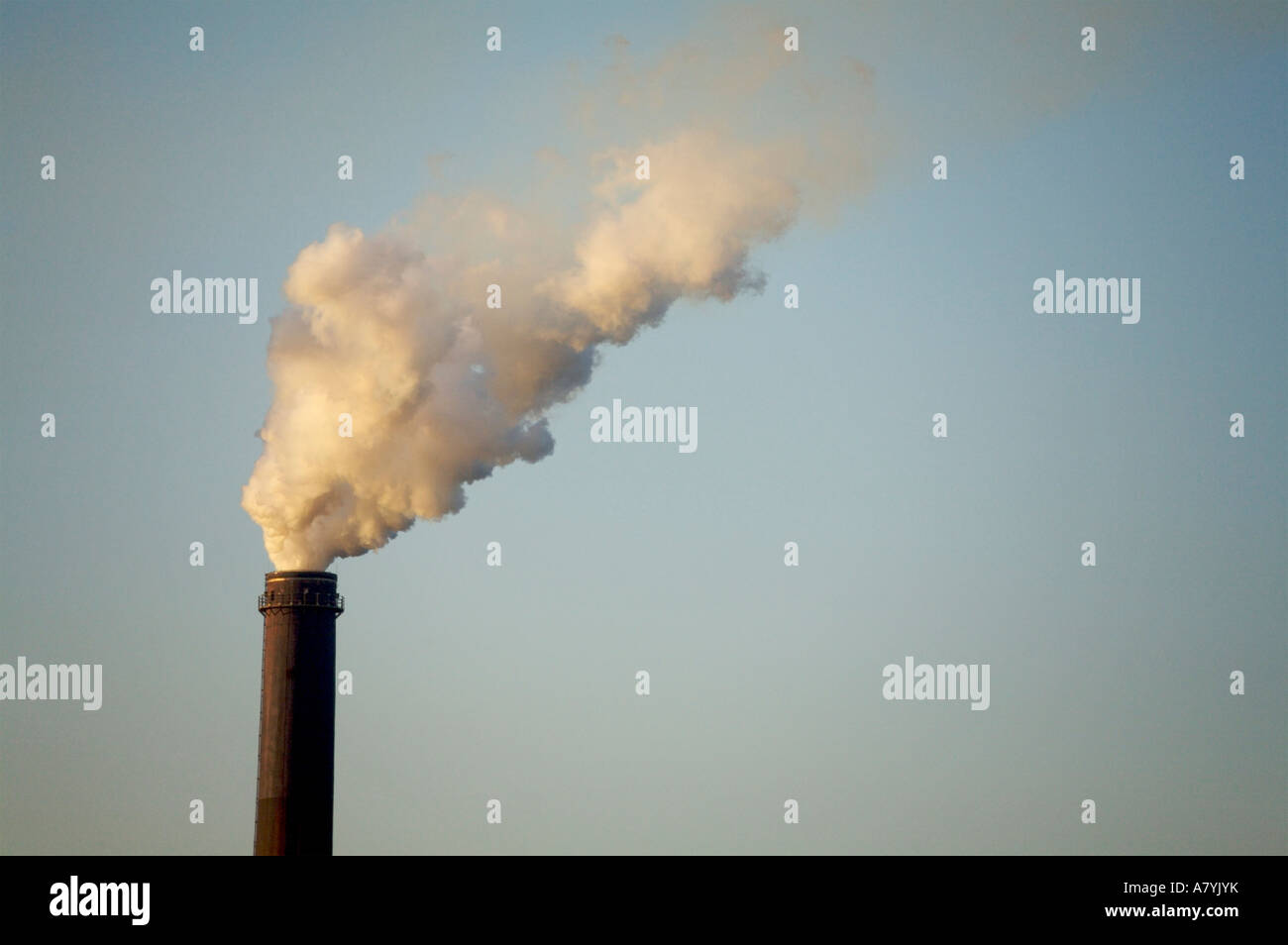 Smokestack of a coal fired powerplant emitting smoke Stock Photo - Alamy