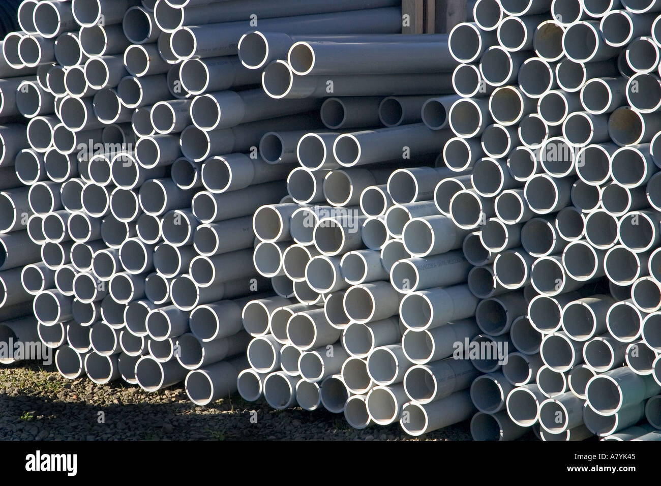 Stacks of PVC pipe at a plumbing supply facility Stock Photo - Alamy