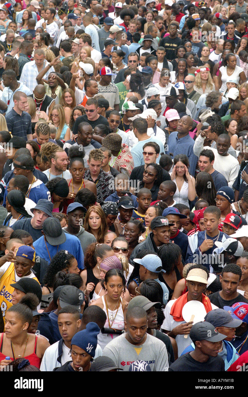 Large multicultural crowd of people in the streets of Nottinghill at ...