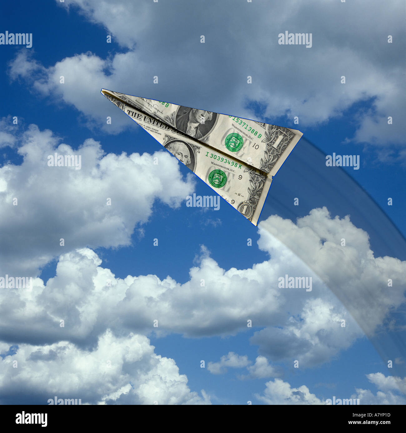 One dollar bill USA folded as a paper airplane flying among clouds in ...
