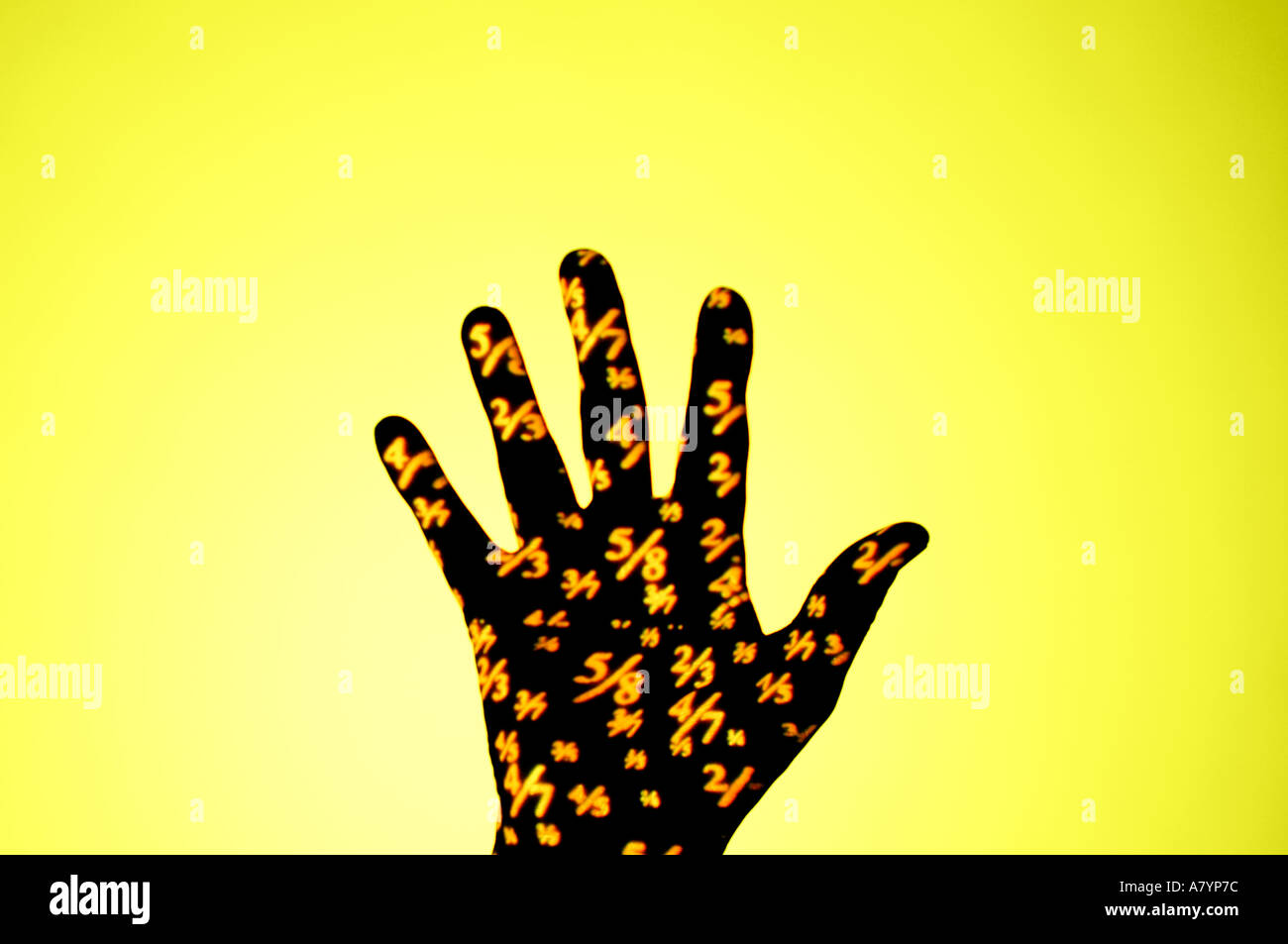 open hand displaying projected image of fractions on palm and fingers ...